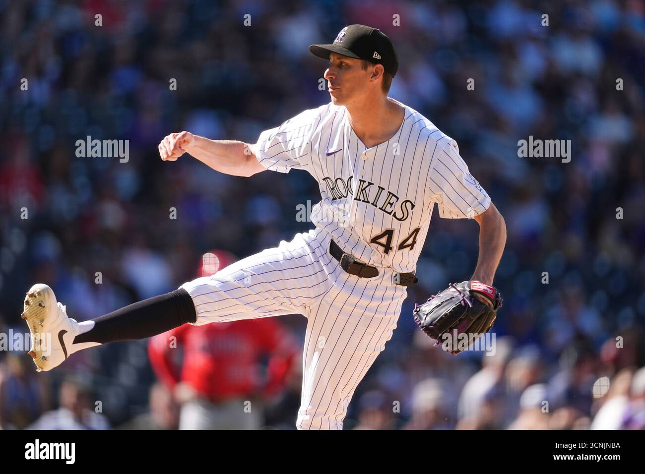 Colorado Rockies relief pitcher Jimmy Herget works against the Los ...