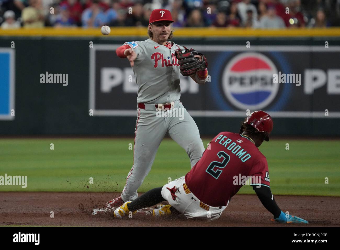 Philadelphia Phillies second base Bryson Stott (5) gets the out on ...