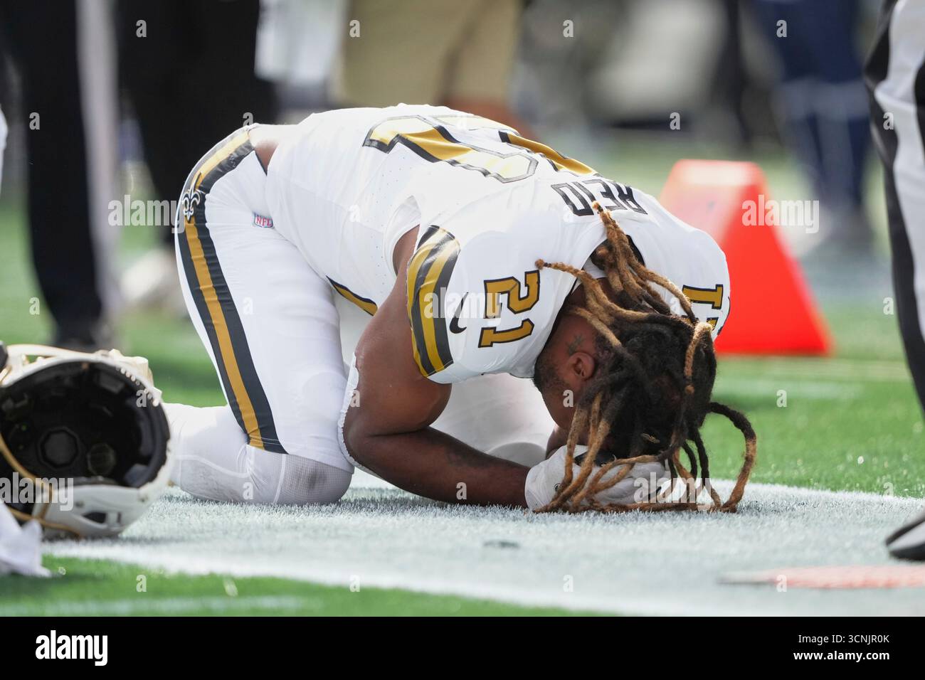 New Orleans Saints safety Justin Reid (21) reacts after being hit ...