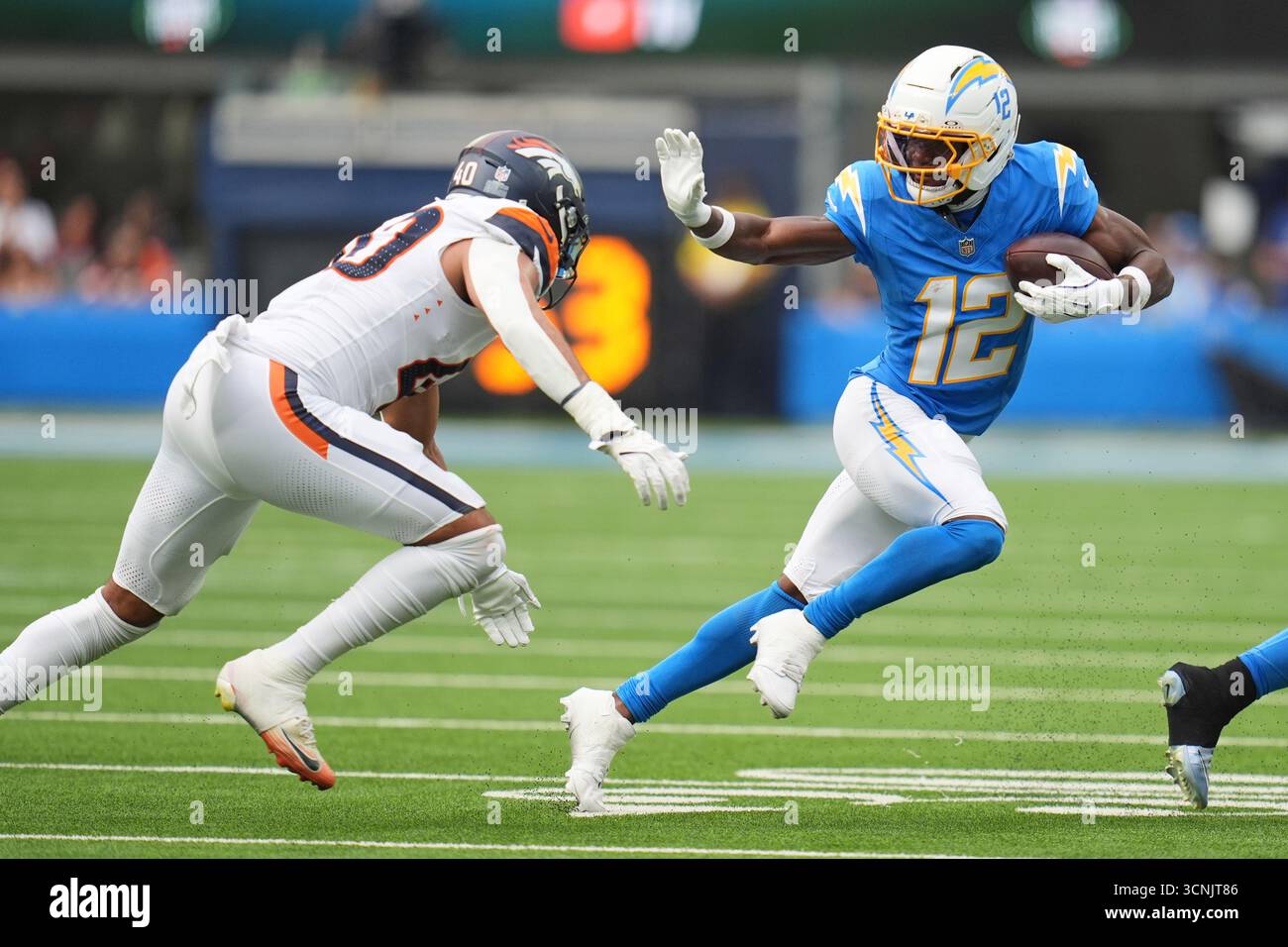 Los Angeles Chargers wide receiver Derius Davis (12) runs after a catch ...