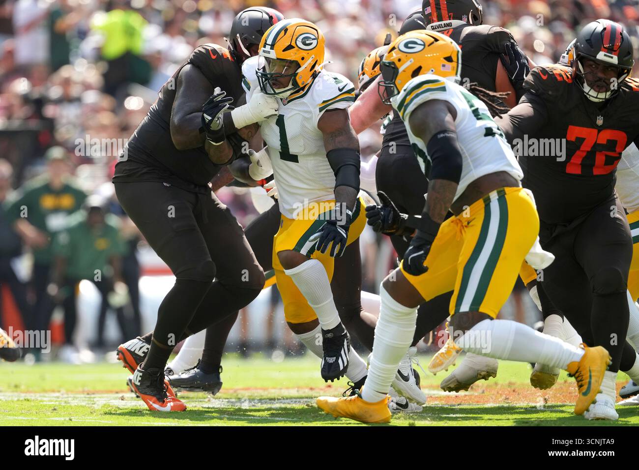 Green Bay Packers linebacker Micah Parsons (1), center, rushes the ...