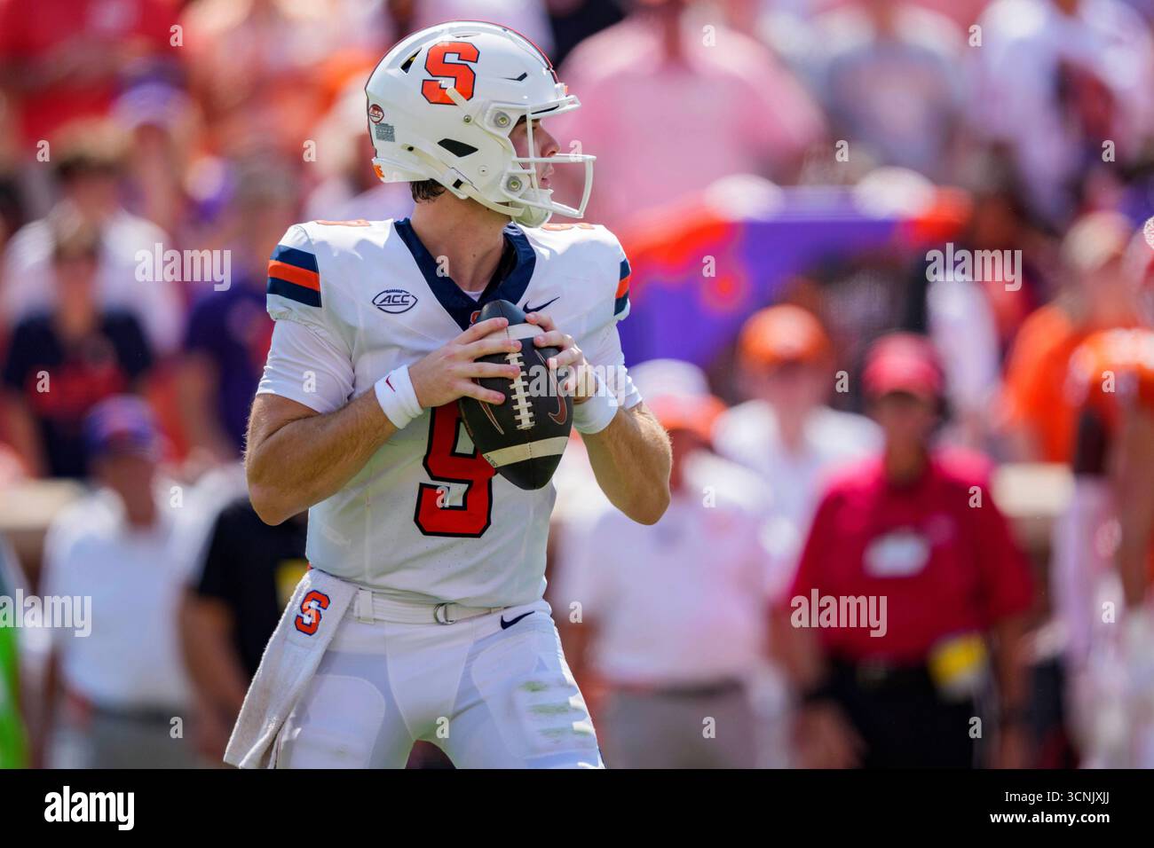 Syracuse quarterback Steve Angeli (9) drops back to pass against ...