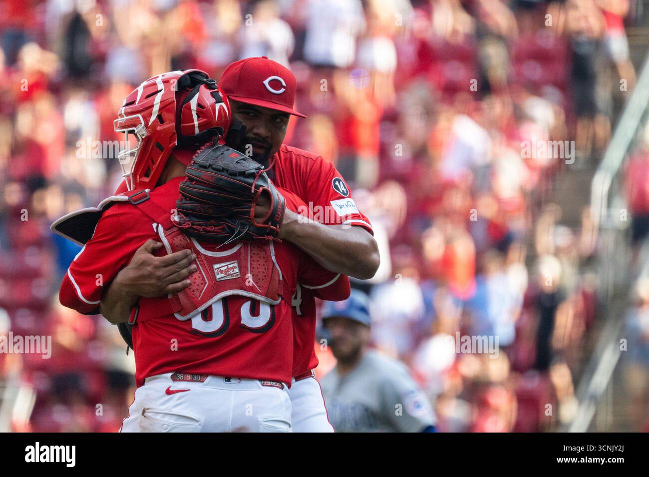 Cincinnati Reds catcher Jose Trevino, left, and pitcher Tony Santillan ...
