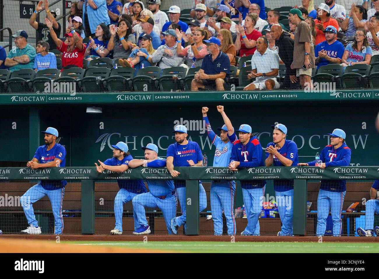 Texas Rangers players react to a double by teammate Alejandro Osuna ...