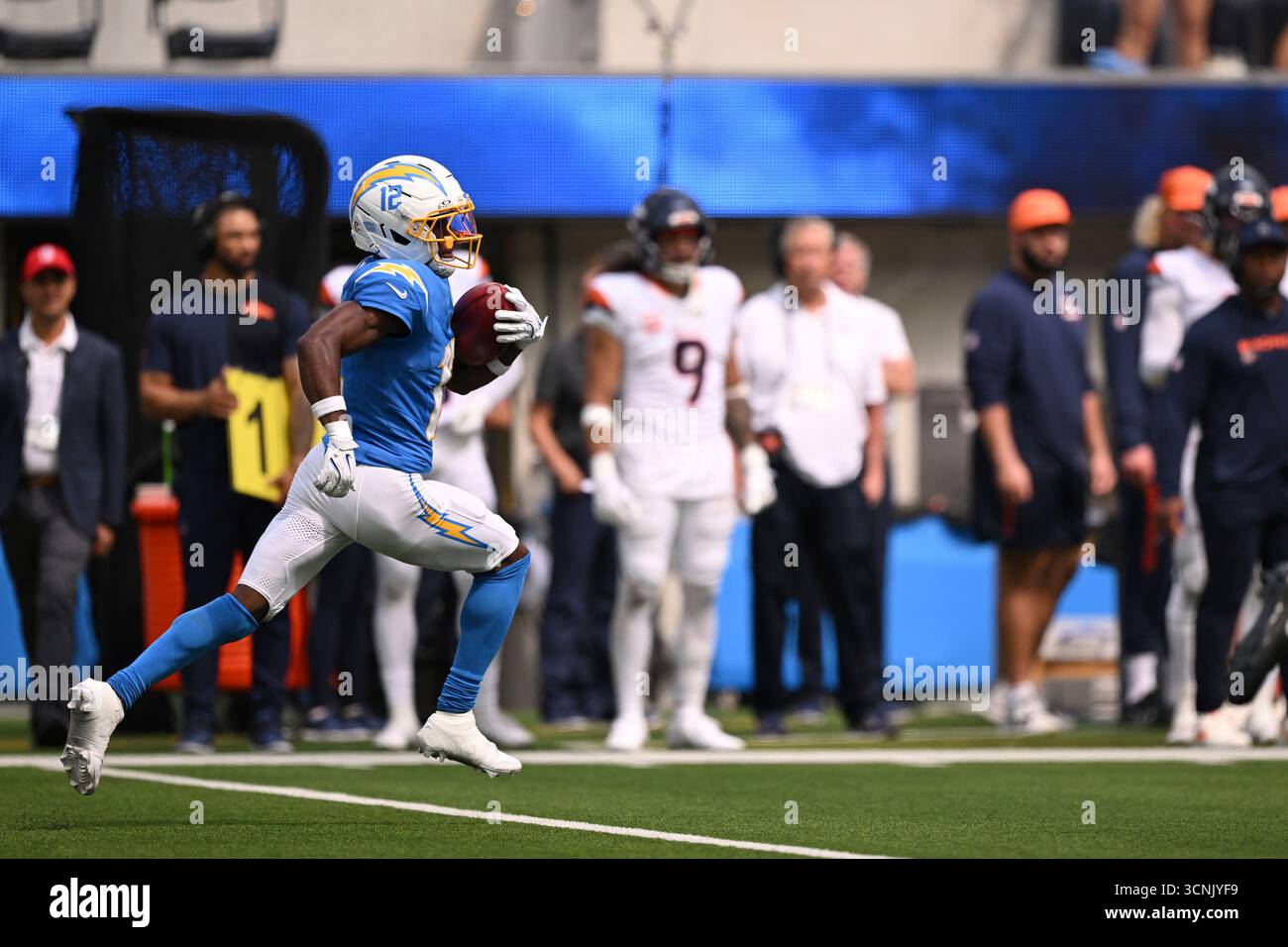 Los Angeles Chargers wide receiver Derius Davis (12) runs after a catch ...