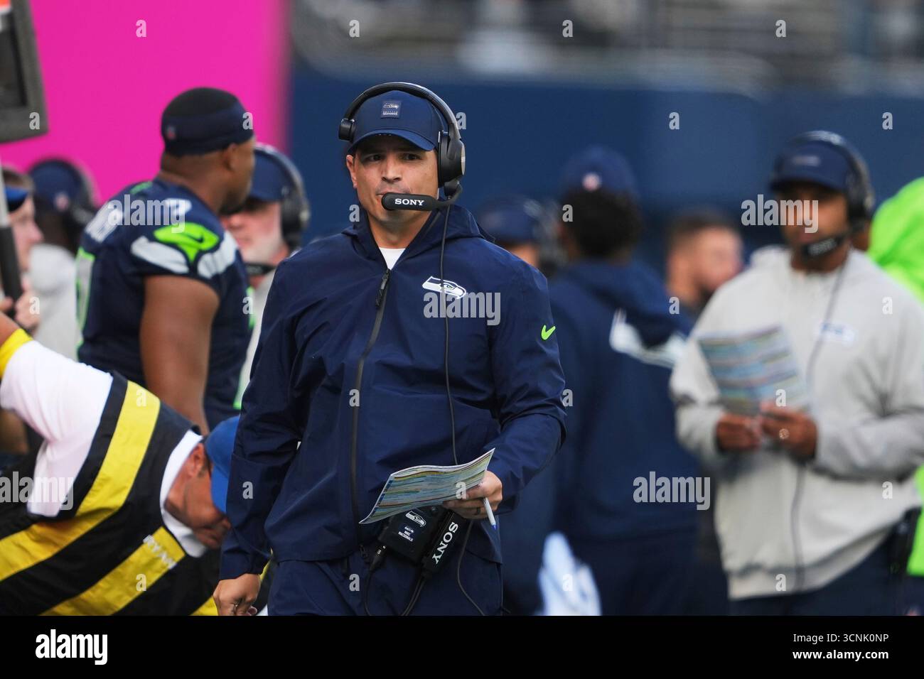 Seattle Seahawks head coach Mike Macdonald walks on the sideline during ...