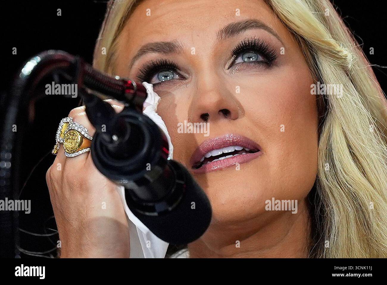 Erika Kirk speaks at a memorial for her husband, conservative activist ...