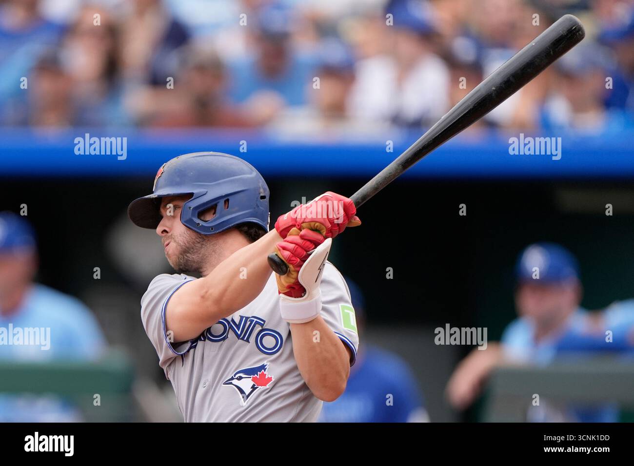 Toronto Blue Jays' Ernie Clement watches his RBI single during the ...