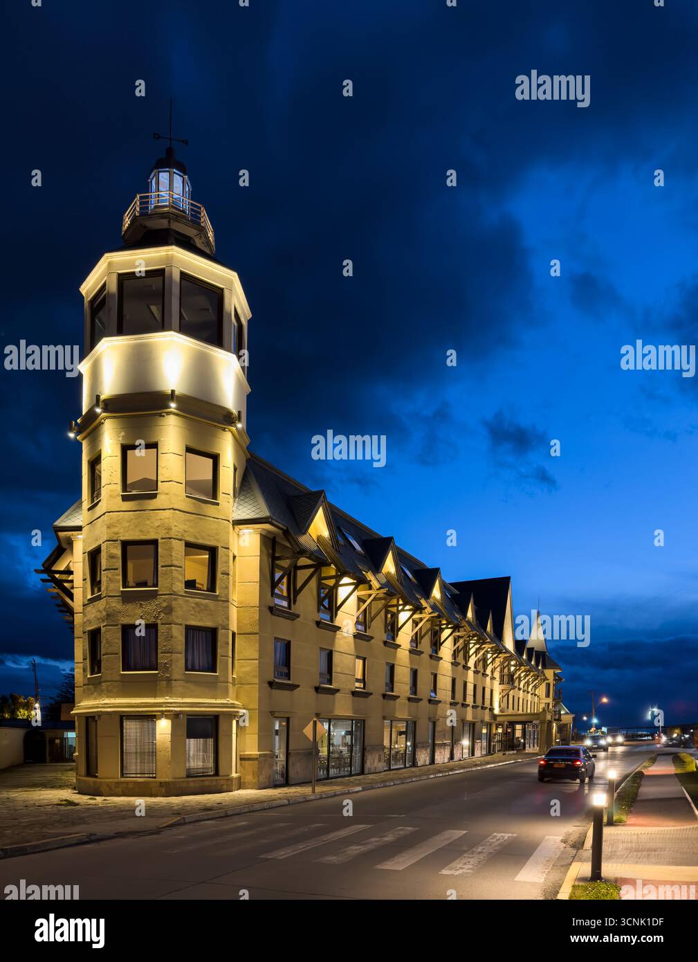 Magnificent building on the waterfront at night. Its castle ...