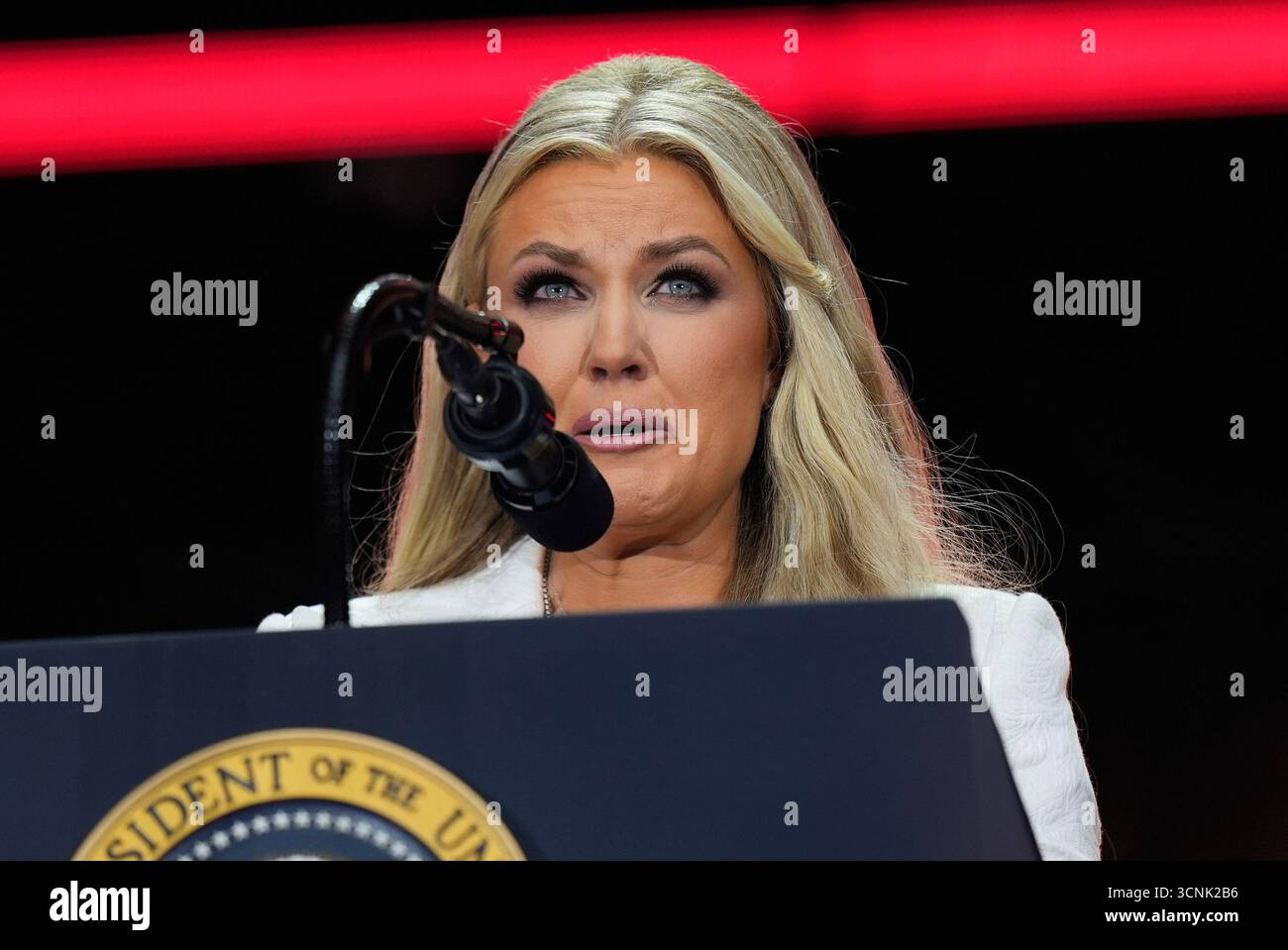 Erika Kirk speaks at a memorial for her husband, conservative activist ...