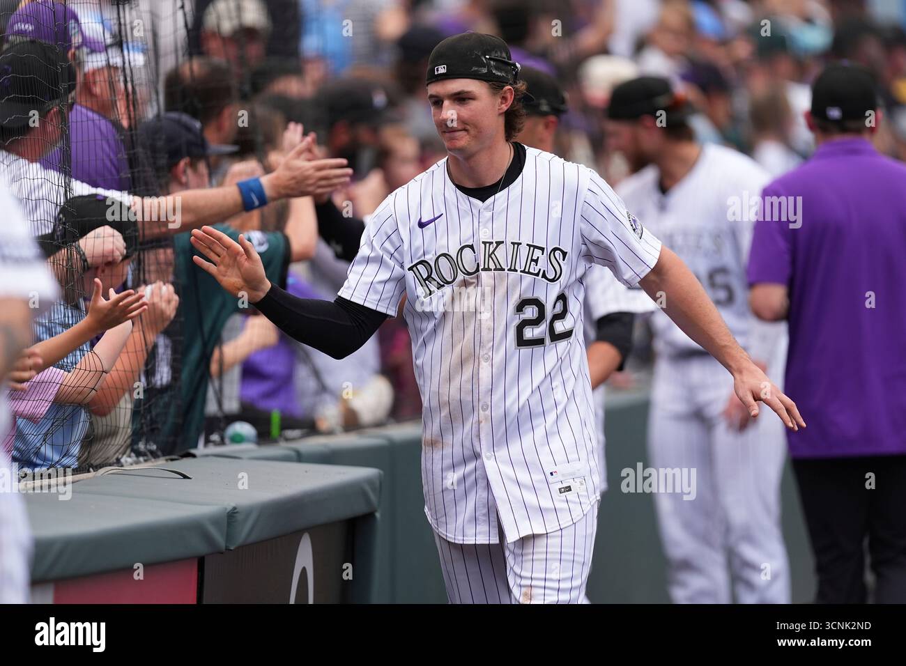 Colorado Rockies outfielder Mickey Moniak greets fans during the ...
