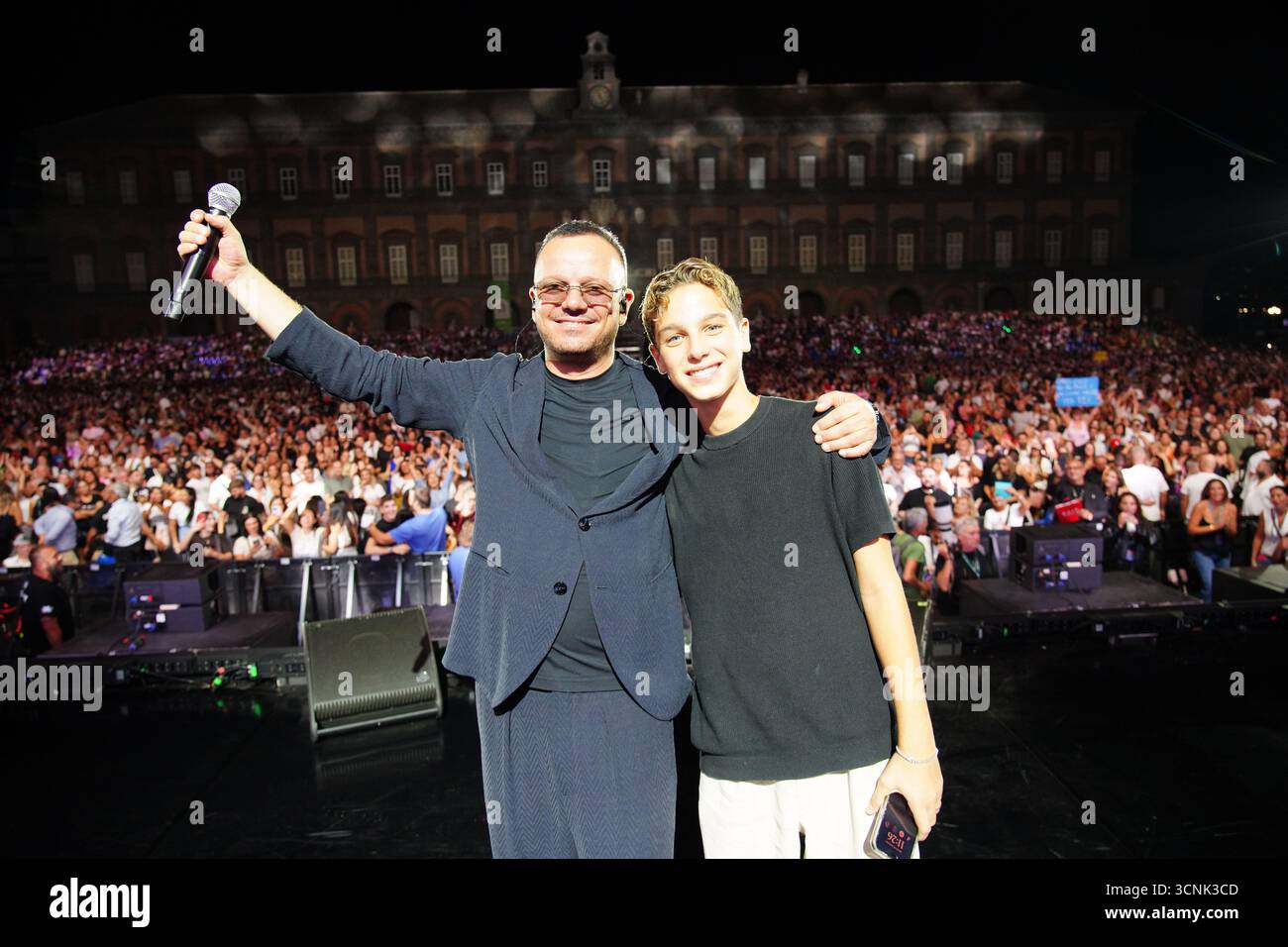 Gigi D'Alessio places a pebliscito Gigi with his son Andrea Stock Photo ...