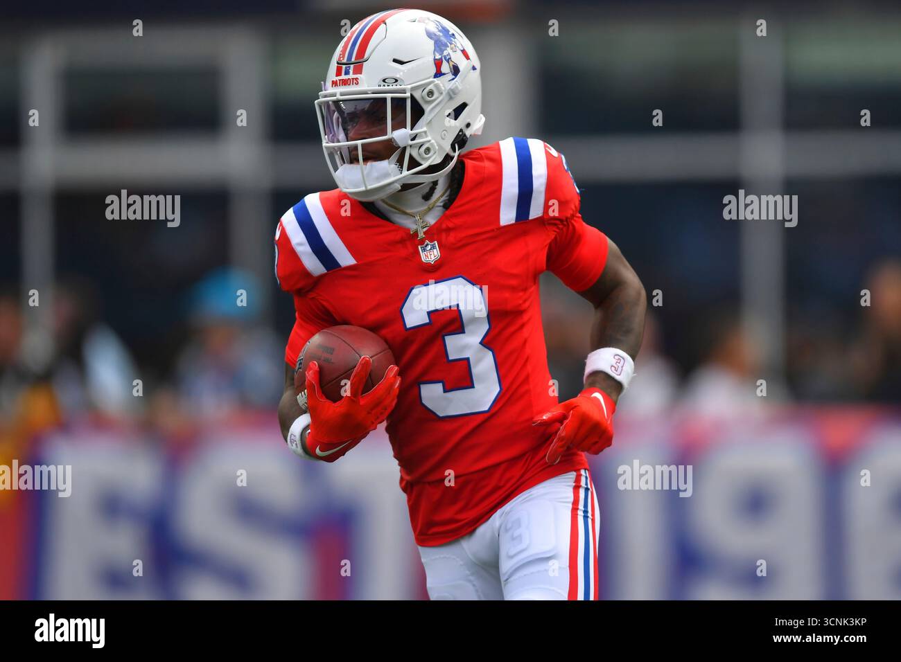 New England Patriots wide receiver Demario Douglas (3) warms up before ...
