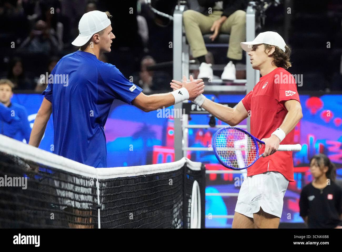 Team World's Alex de Minaur, of Australia, right, is congratulated by ...