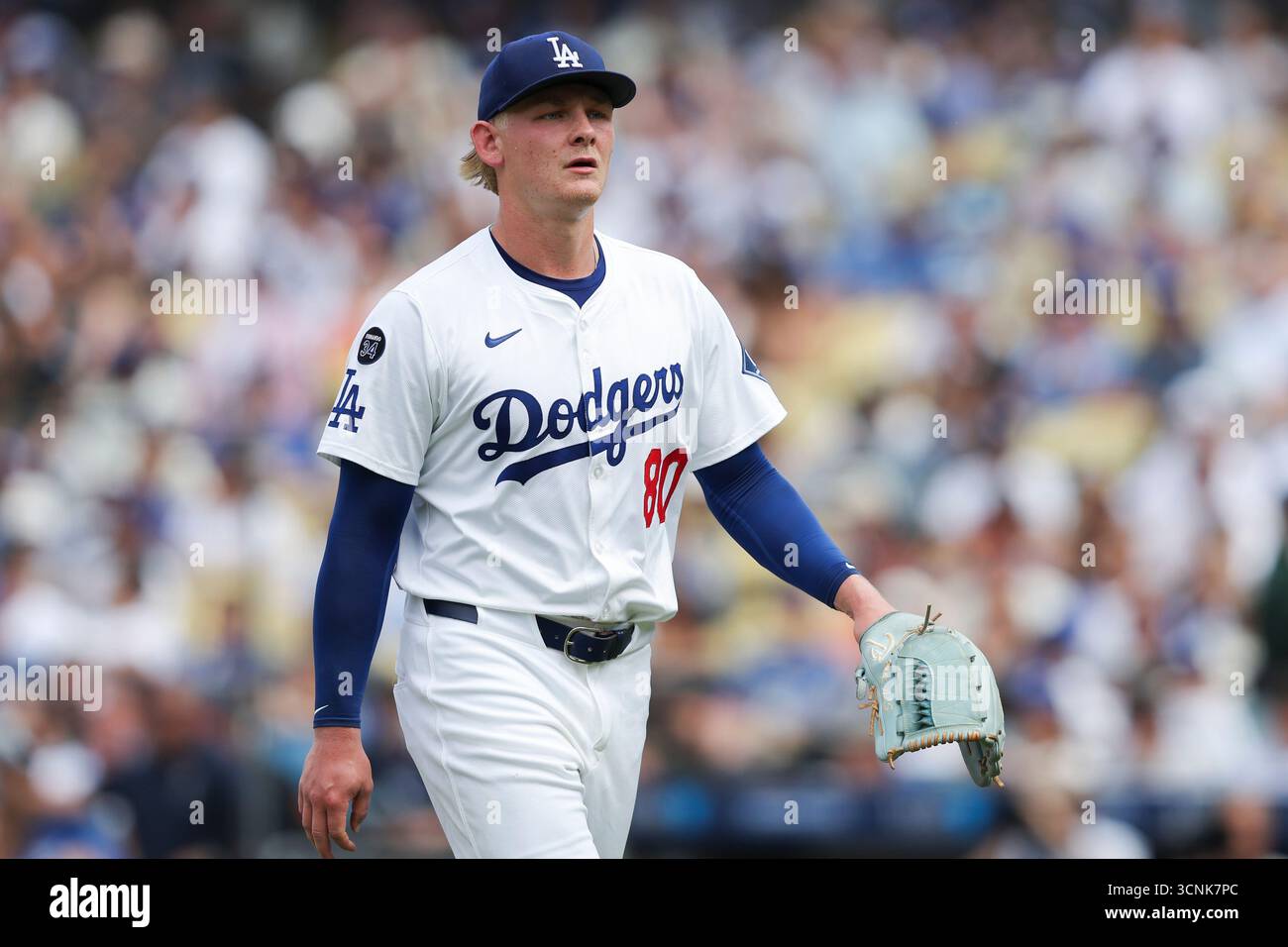 Los Angeles Dodgers pitcher Emmet Sheehan walks towards the dugout ...