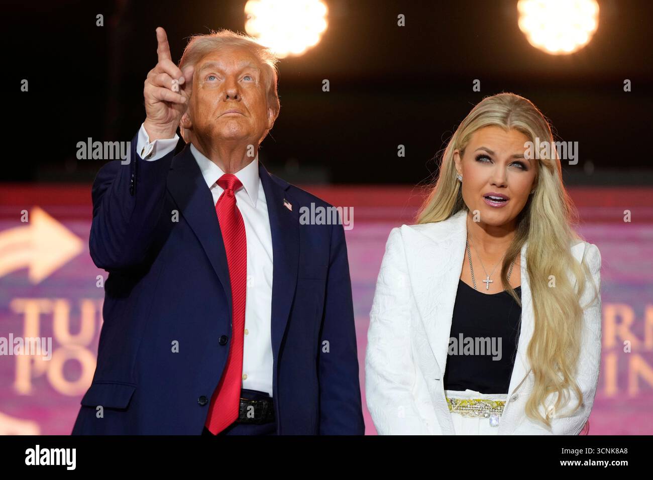 President Donald Trump, left, stands with Erika Kurk at the conclusion ...