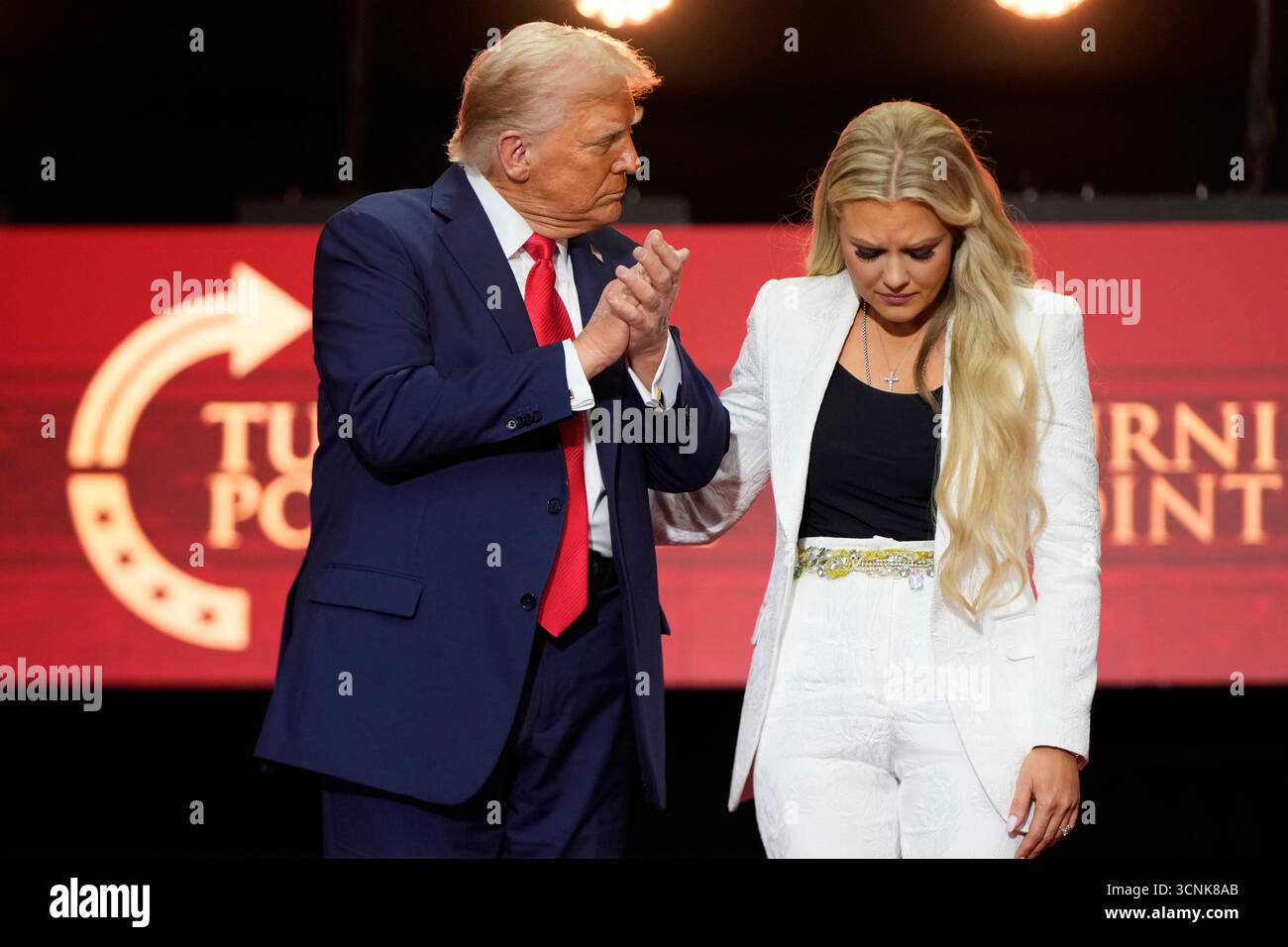 President Donald Trump, left, stands with Erika Kurk at the conclusion ...