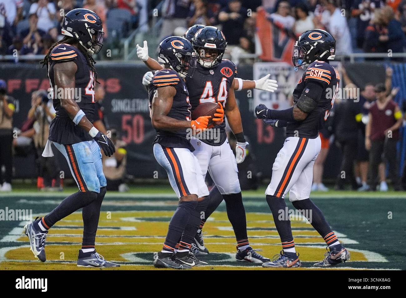 Chicago Bears' Kevin Byard III, center left, Noah Sewell (44) and ...