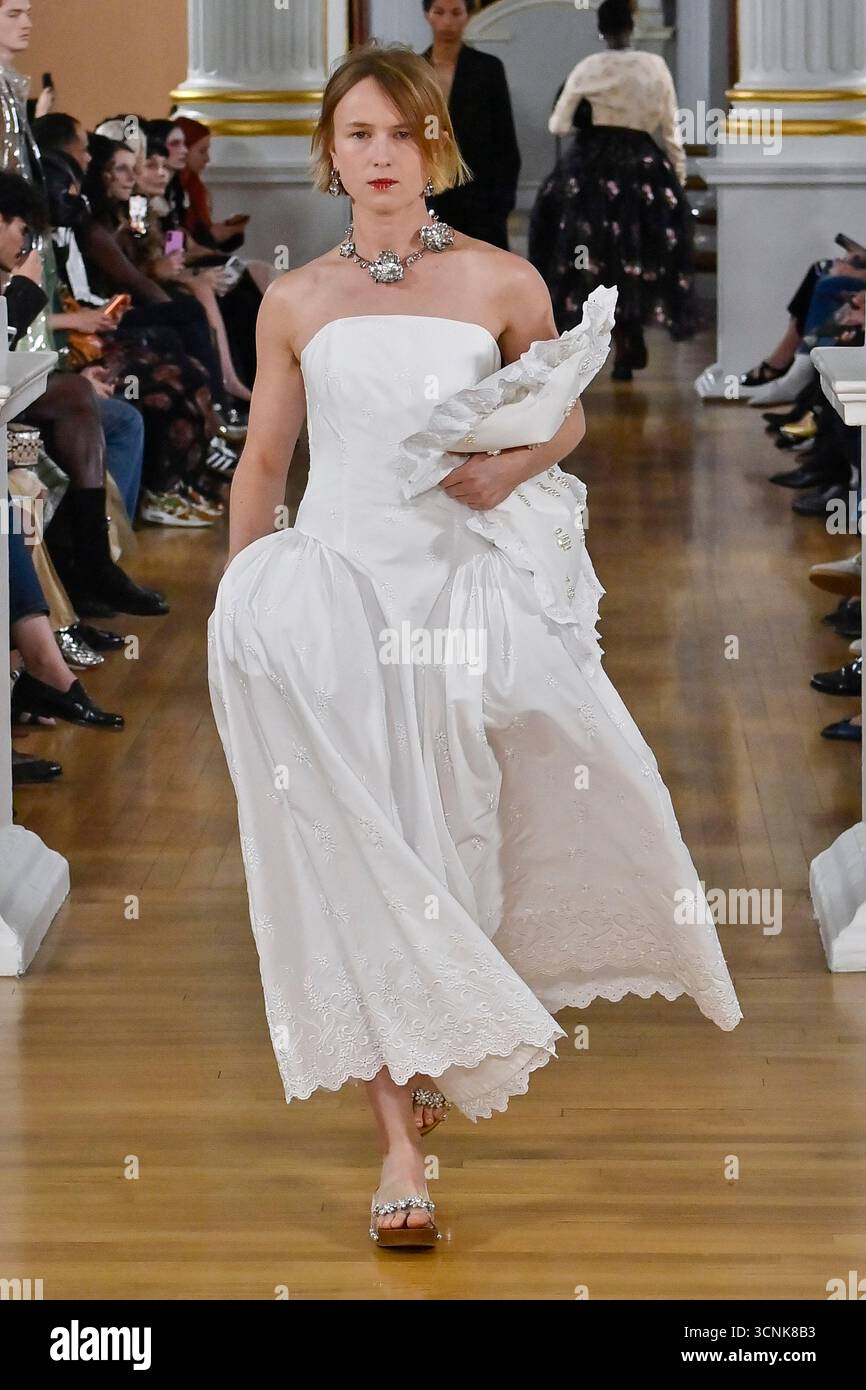 A model is seen on the catwalk at the Simone Rocha fashion show during ...
