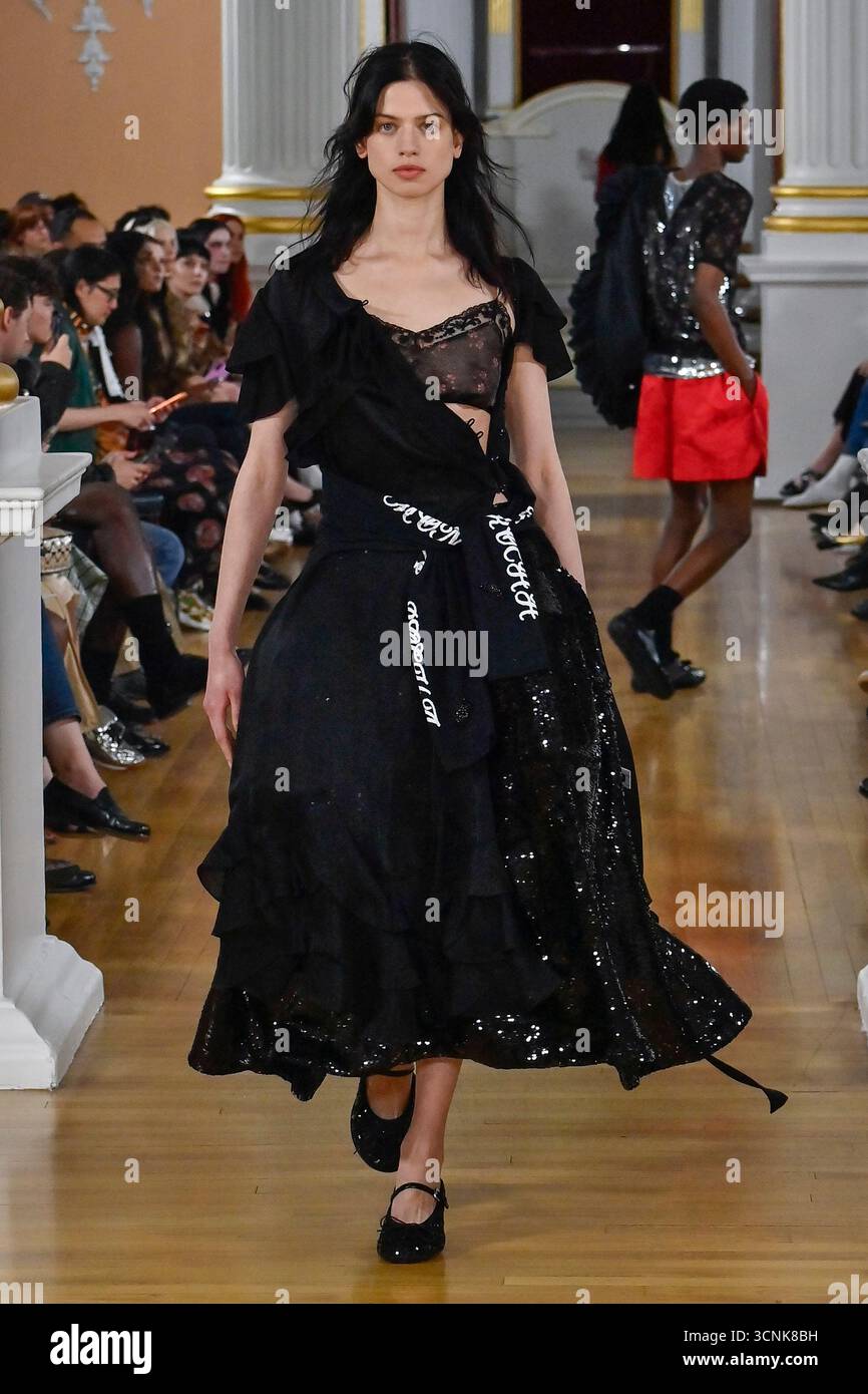 A model is seen on the catwalk at the Simone Rocha fashion show during ...