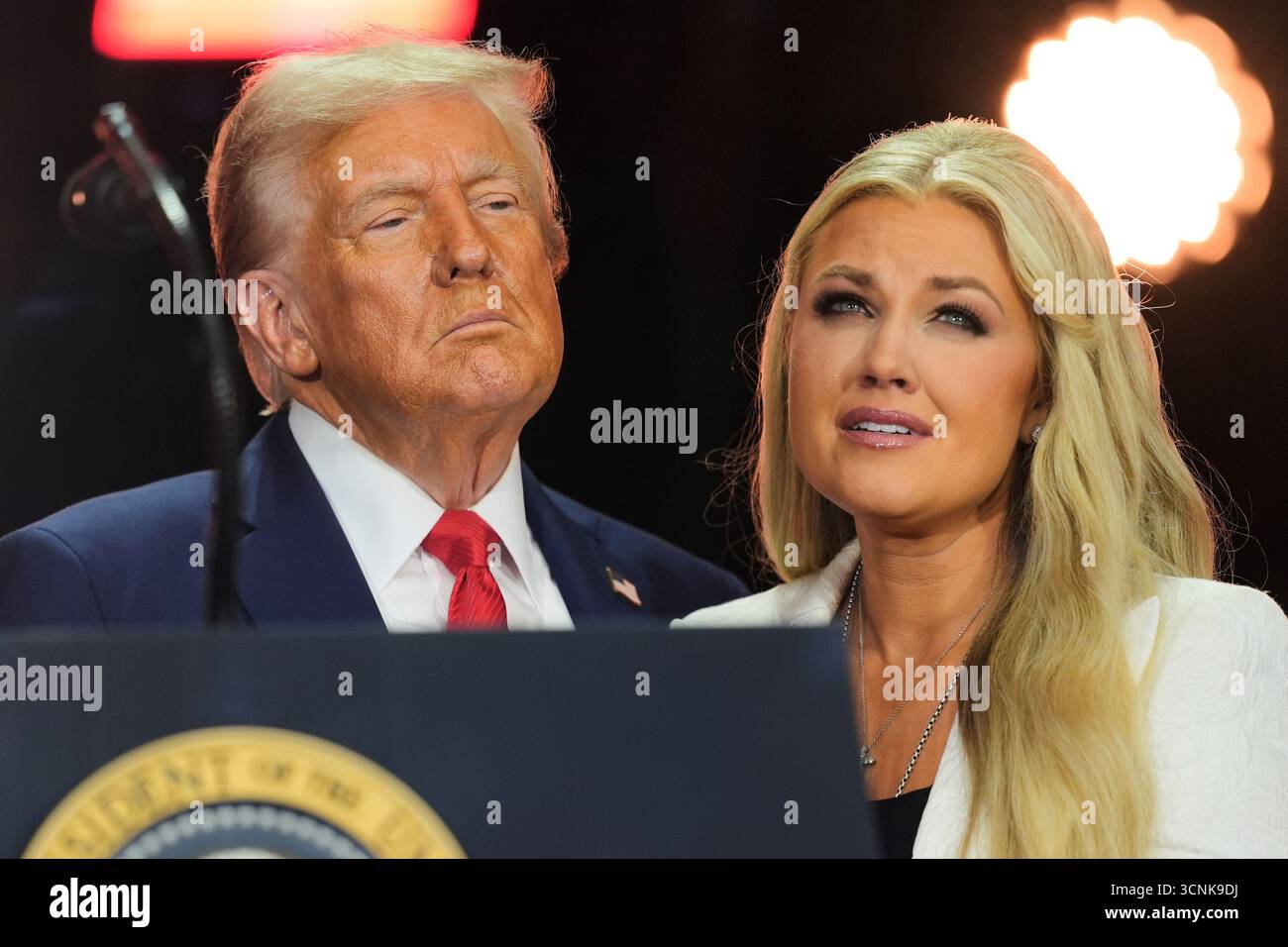 President Donald Trump, left, stands with Erika Kurk at the conclusion ...