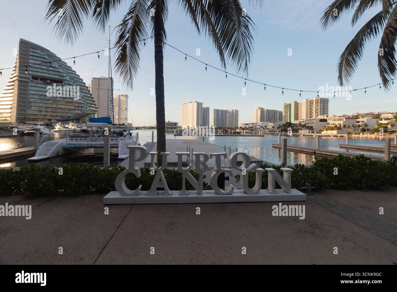 Close up to a lettering sign of puerto cancun neighborhood with a ...