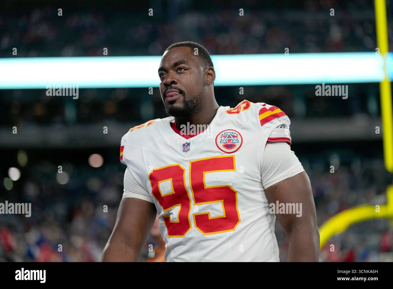Kansas City Chiefs defensive tackle Chris Jones walks off the field after warming up before an ...