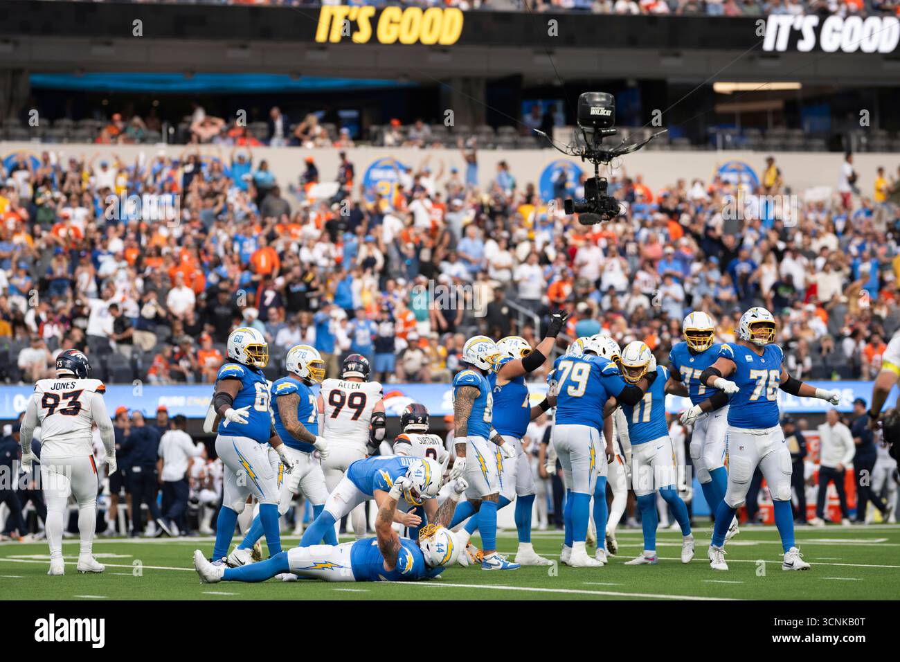 Los Angeles Chargers players celebrate the team's win over the Denver ...