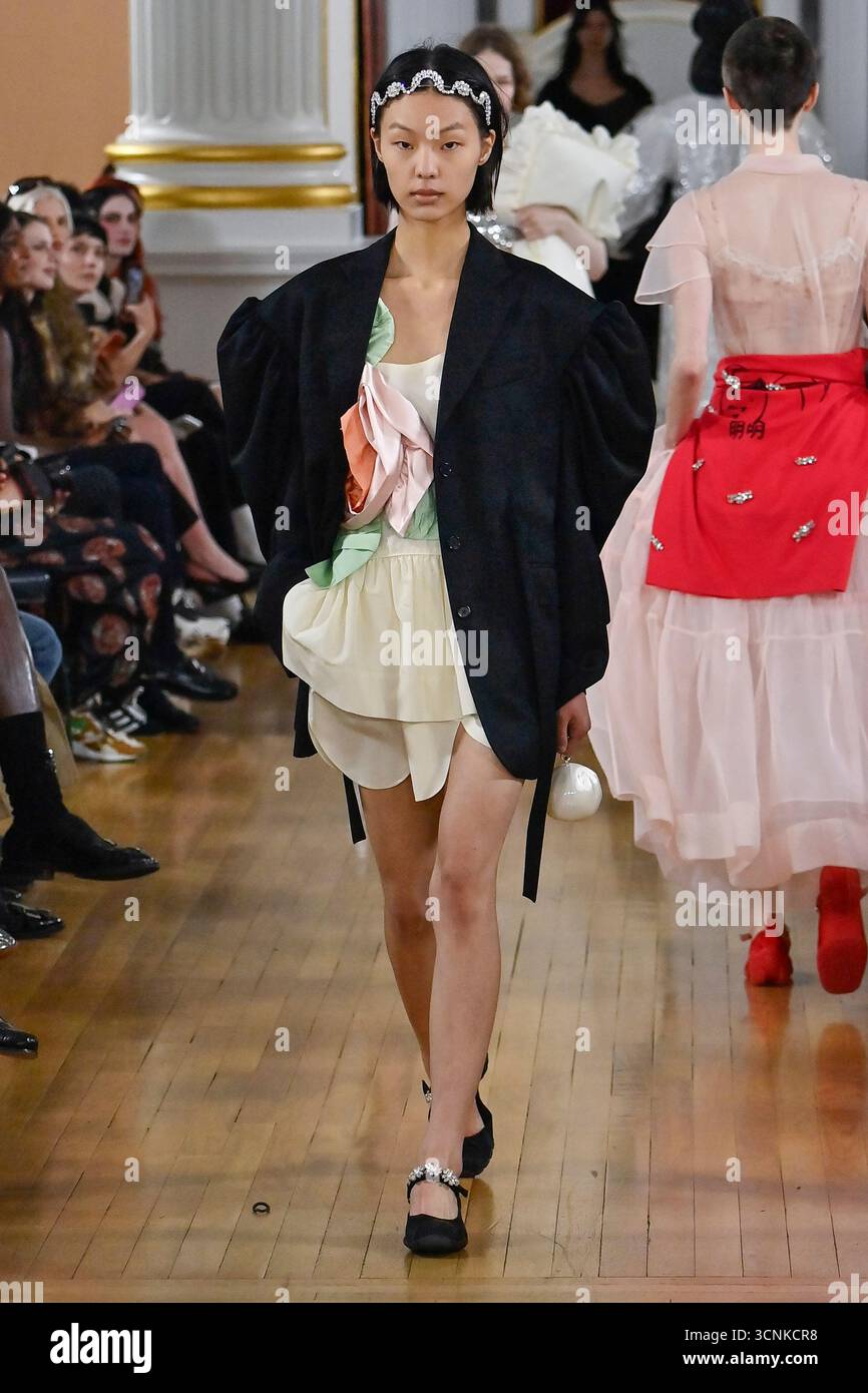A model is seen on the catwalk at the Simone Rocha fashion show during ...