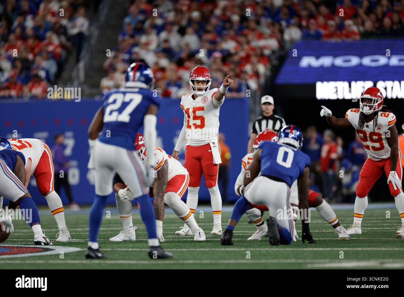 Kansas City Chiefs quarterback Patrick Mahomes points during the first ...