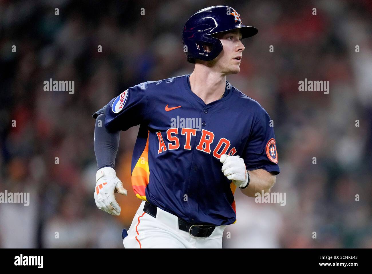 Houston Astros' Zachary Cole rounds the bases after hitting a solo home ...