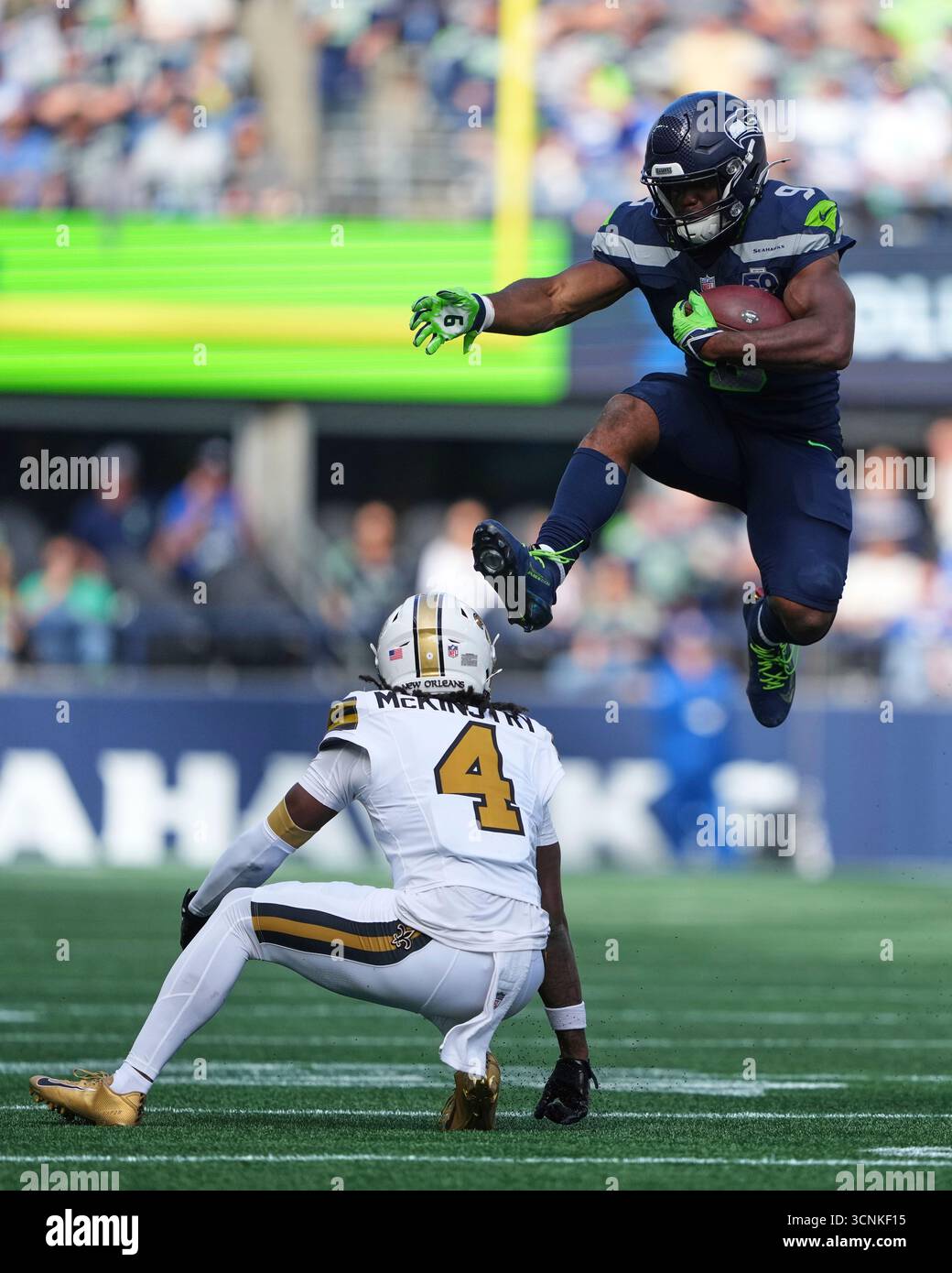Seattle Seahawks running back Kenneth Walker III (9) jumps over New ...