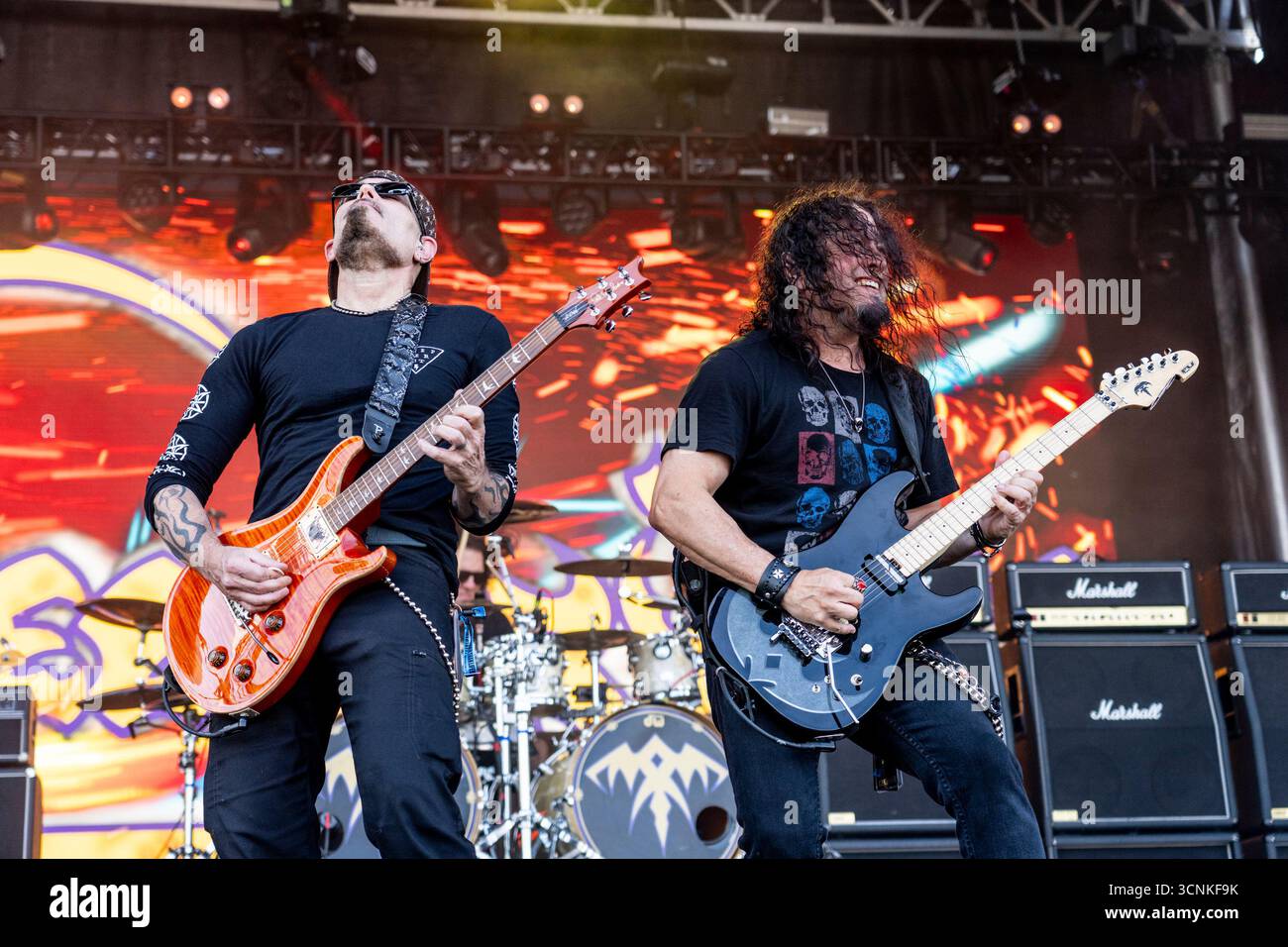 Mike Stone, left, and Michael Wilton of Queensryche perform during ...