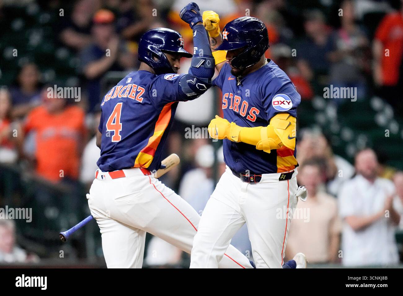 Houston Astros' Isaac Paredes, right, celebrates after his solo home ...