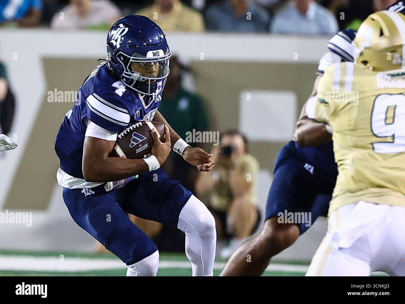 September 18,2025: Rice University quarterback Chase Jenkins (4) runs ...