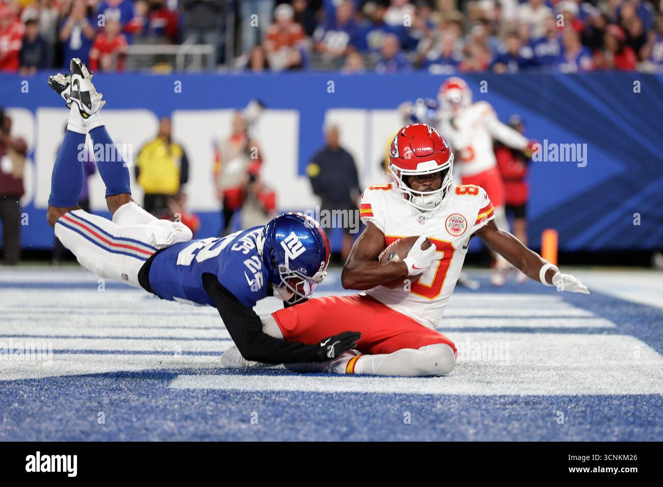 Kansas City Chiefs wide receiver Tyquan Thornton (80) scores as New York Giants cornerback Dru ...
