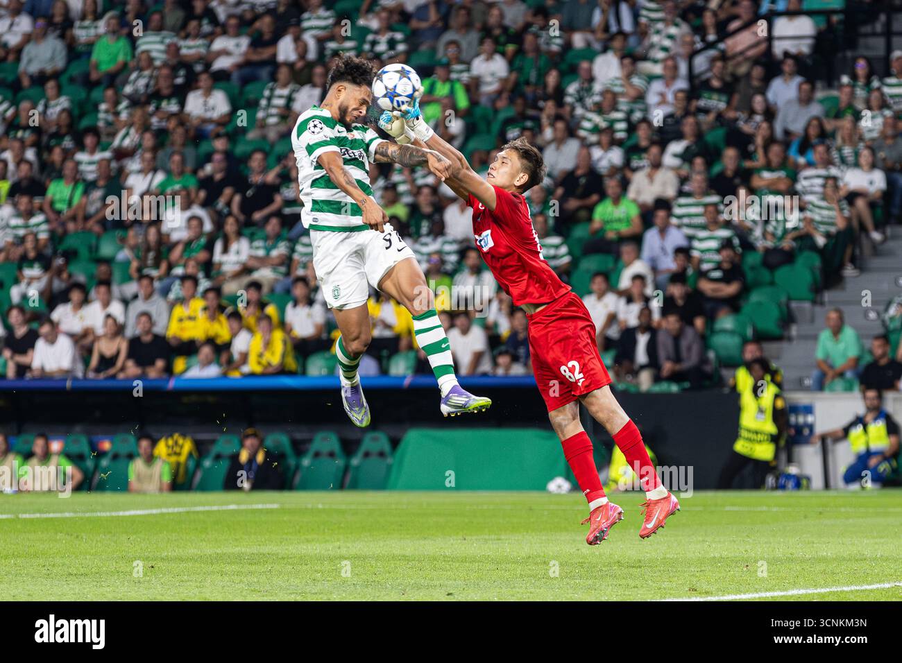 Luis Suarez of Sporting CP with Sherkhan Kalmurza of FC Kairat Almaty ...