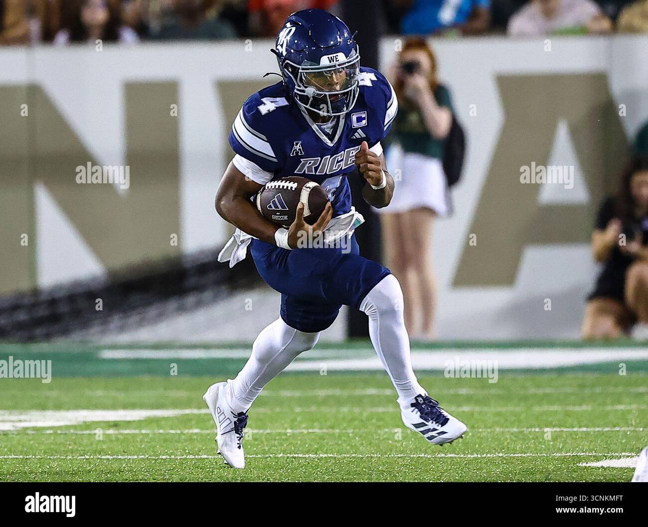 September 18,2025: Rice University quarterback Chase Jenkins (4) runs ...