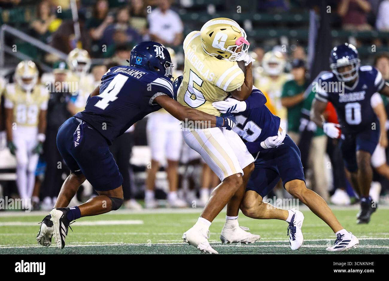 September 18,2025: Rice University saftey Marcus Williams (4) and Rice ...