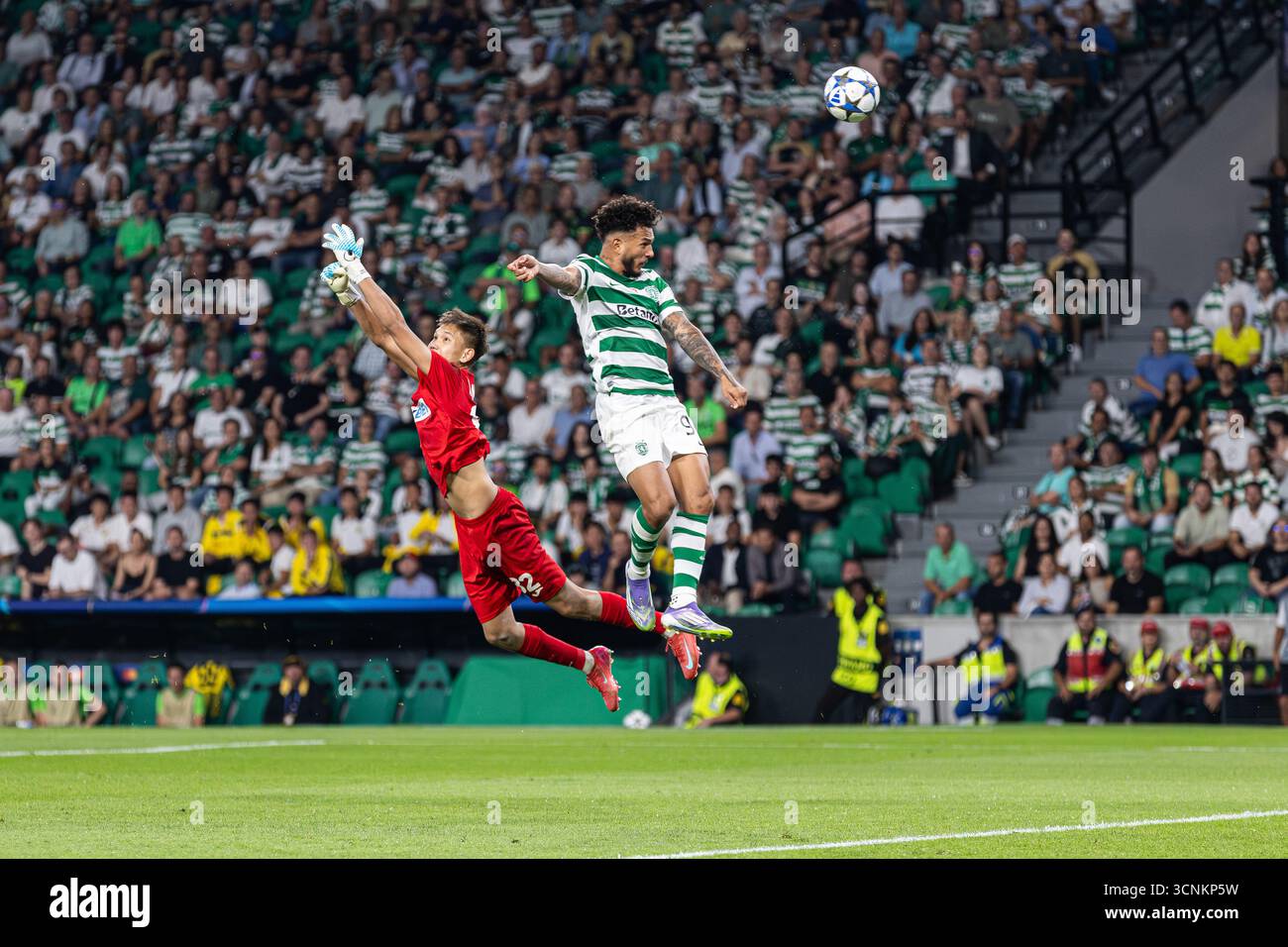 Luis Suarez of Sporting CP with Sherkhan Kalmurza of FC Kairat Almaty ...