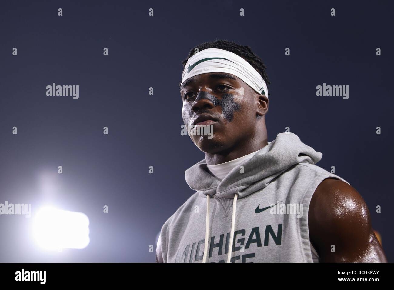 Michigan State wide receiver Nick Marsh (6) walks off of the field ...