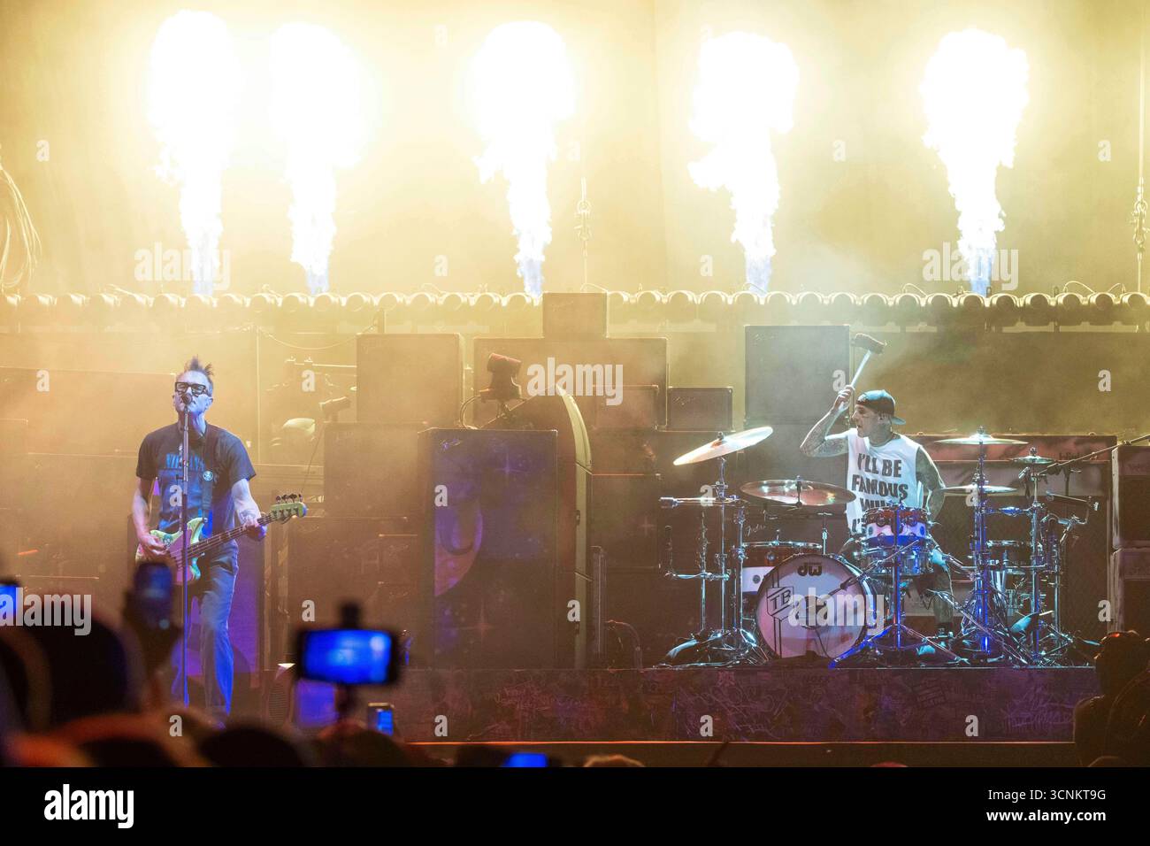 Mark Hoppus, left, and Travis Barker, of Blink 182, perform during the ...