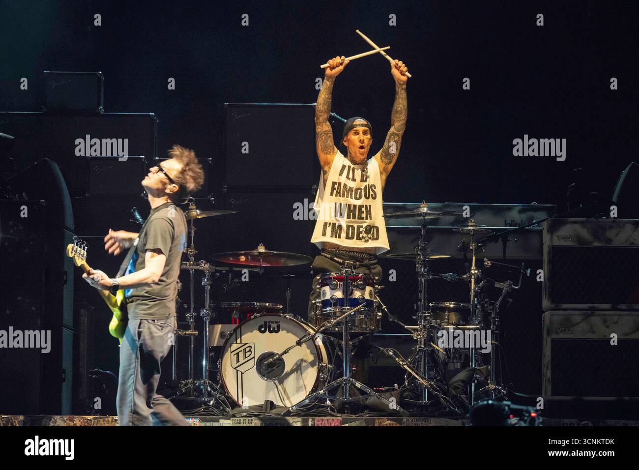 Mark Hoppus, left, and Travis Barker, of Blink 182 perform during the ...