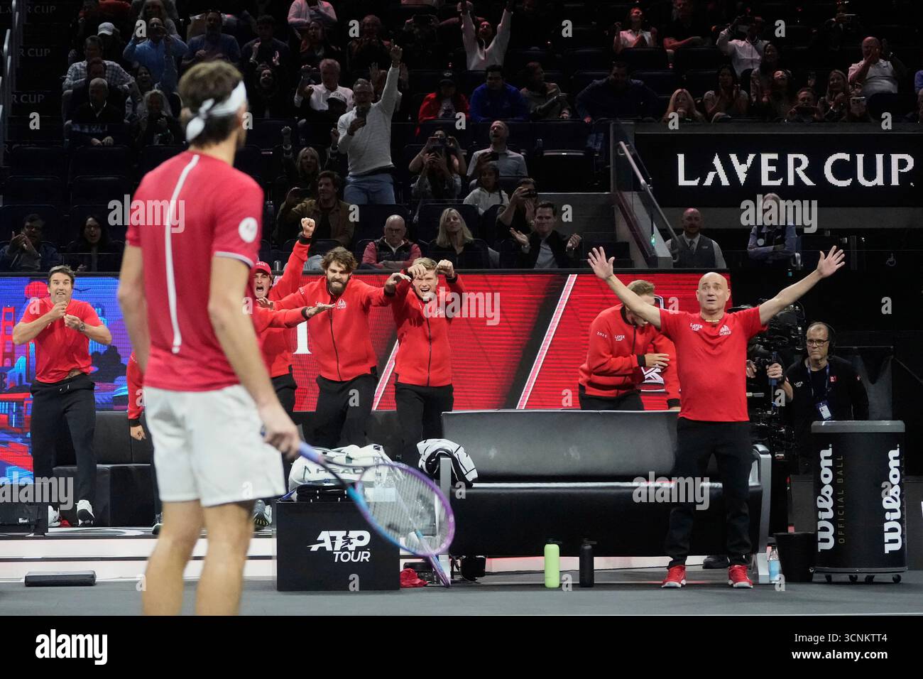 Team World captain Andre Agassi, right, and players react after Taylor ...