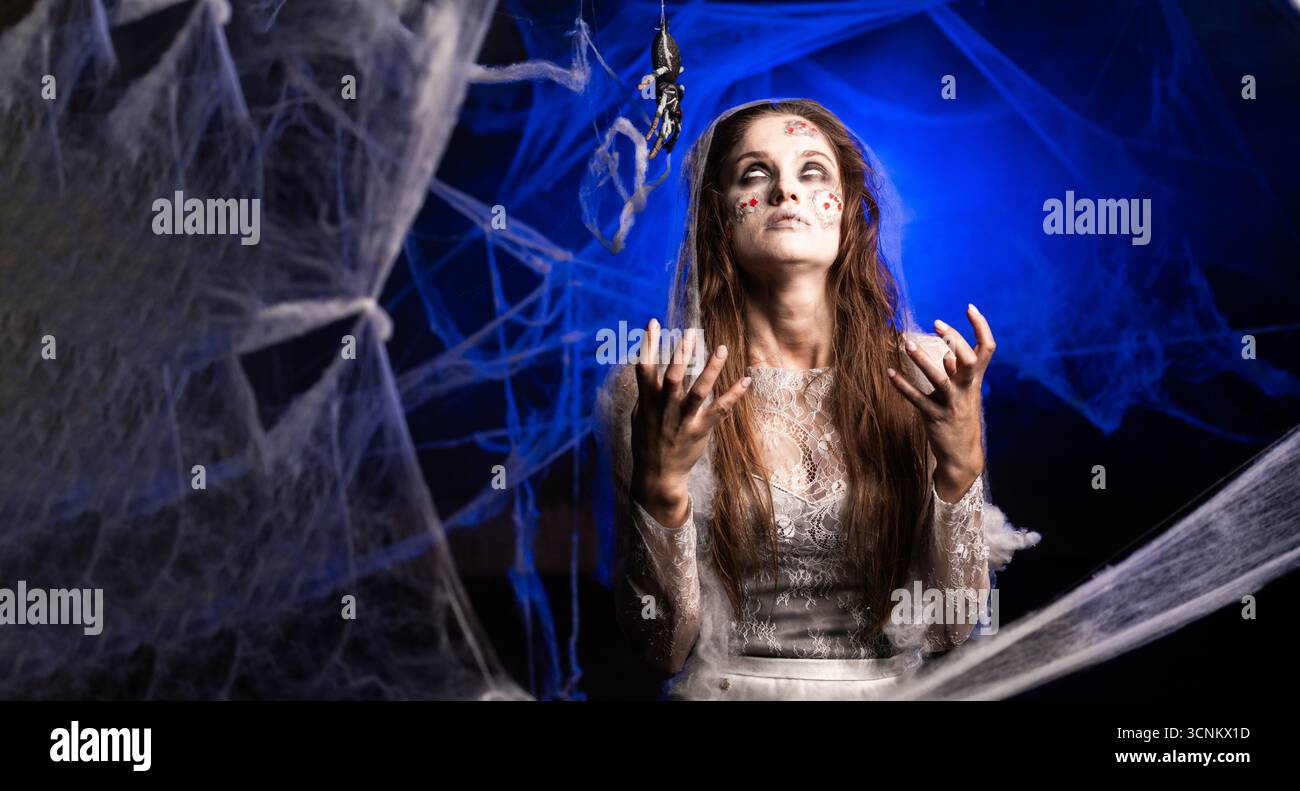 Angry and annoyed creepy woman with horrible scary Halloween zombie ...