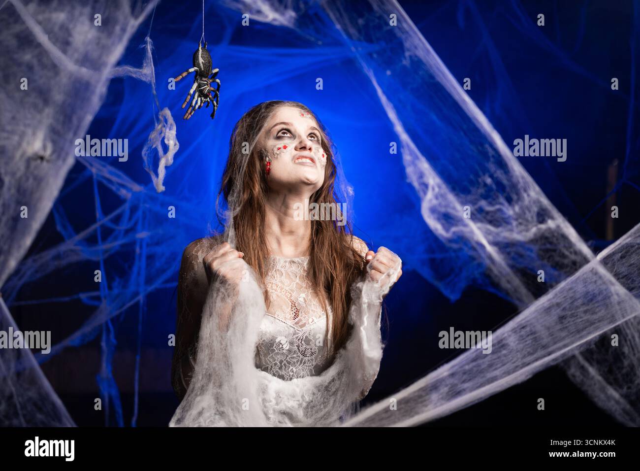 Screaming face horror spider web hi-res stock photography and images ...