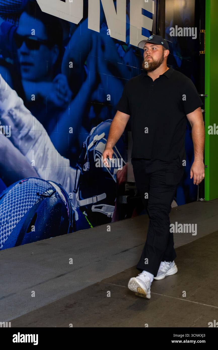 Seattle Seahawks guard Bryce Cabeldue (77) arrives before an NFL ...