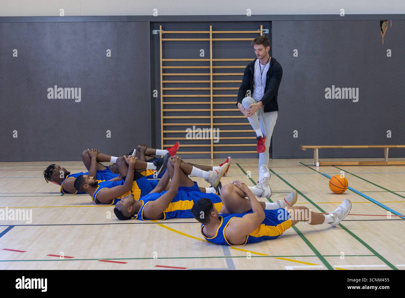 Stretching five basketball players hi-res stock photography and images ...