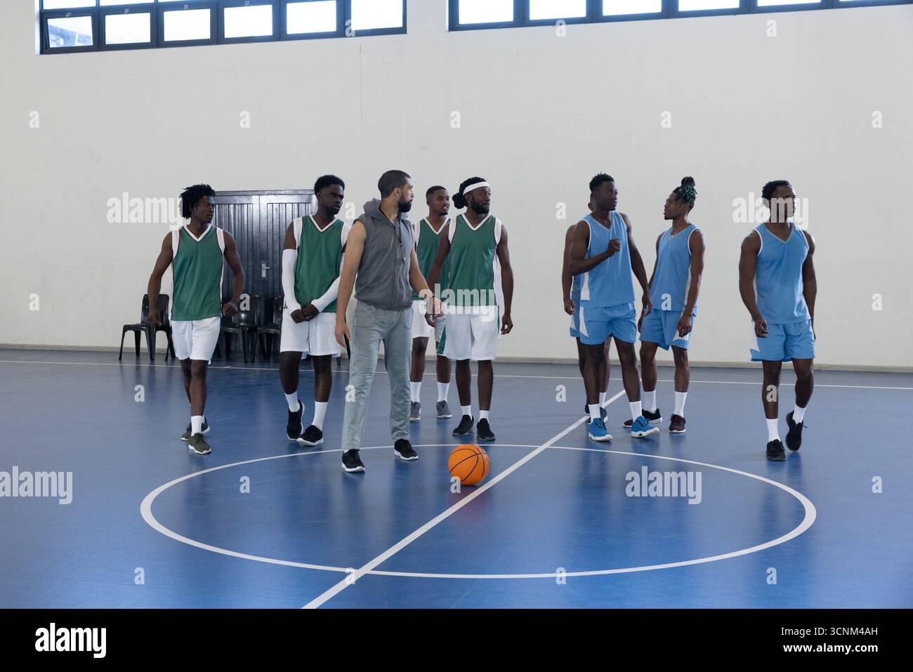 Diverse basketball players walking hi-res stock photography and images ...
