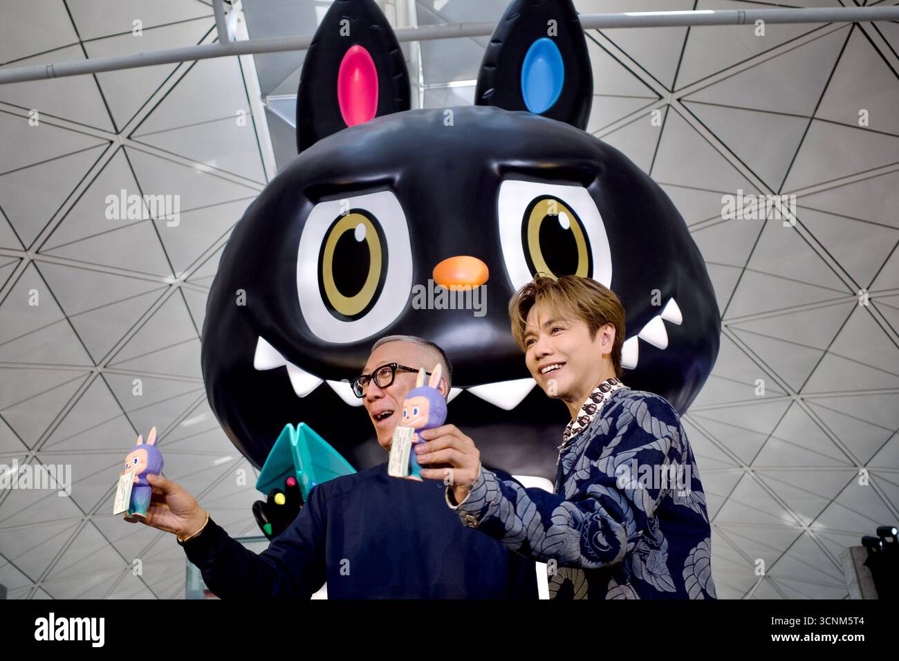 Hong Kong artist Kasing Lung and singer Hins Cheung posing photo at the ...
